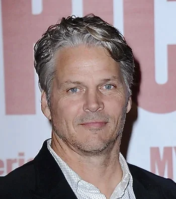 About Michael Reilly Burke: logo